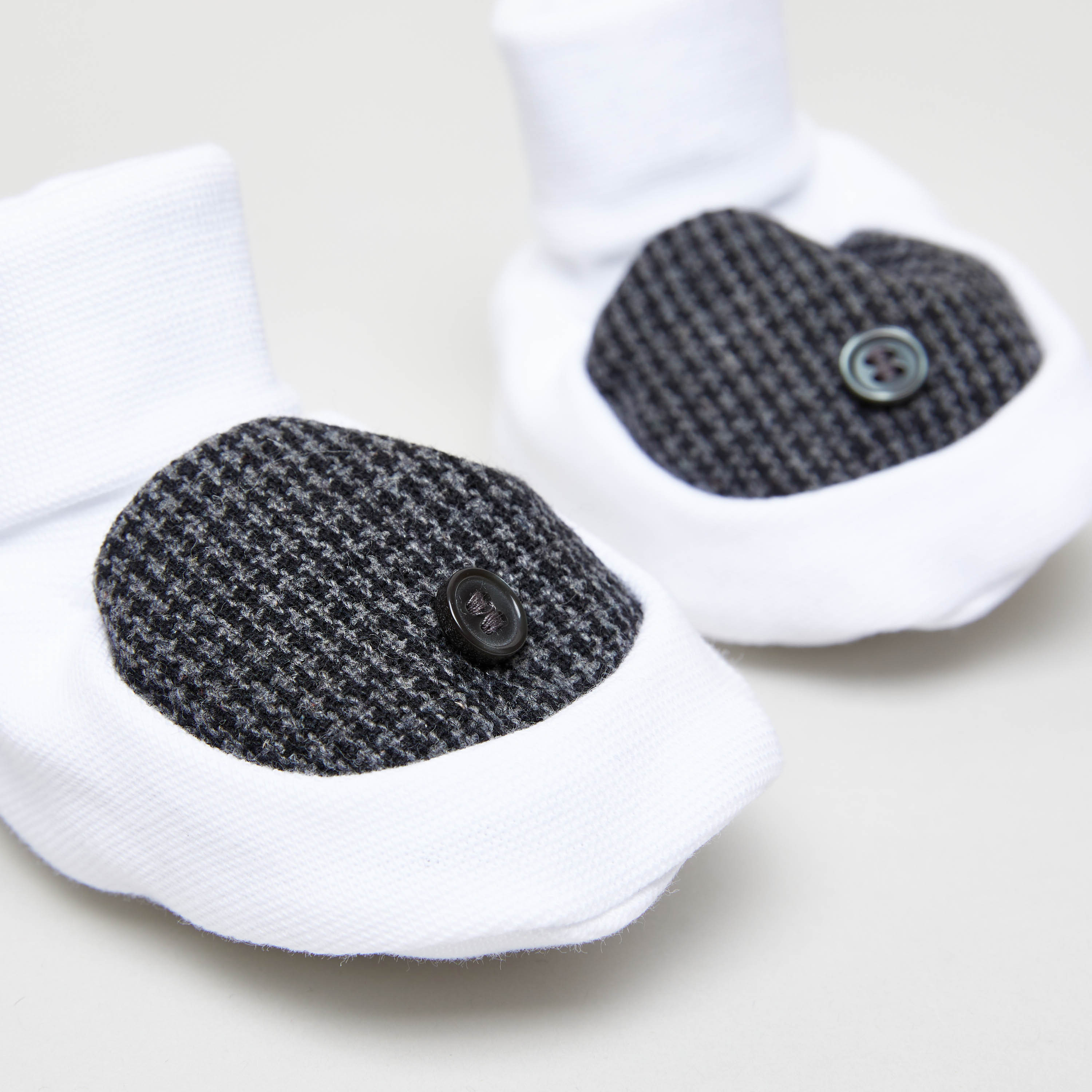 Buy Giggles Textured Booties with Button Applique Online | Centrepoint UAE